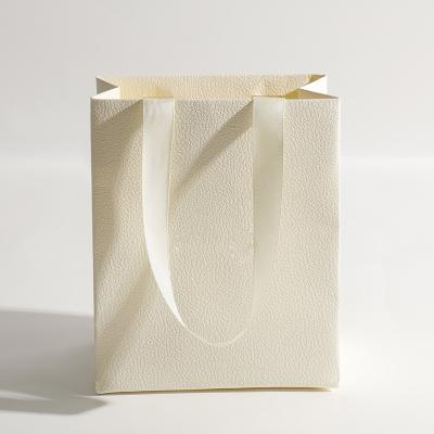 China Exquisite Jewelry Packaging Bags Gift Bags High-Quality Paper Bags With Customizable Logos for sale