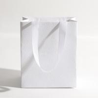China Exquisite Jewelry Packaging Bags Gift Bags High-Quality Paper Bags With Customizable Logos for sale