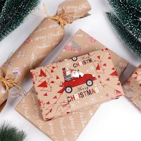 China Vintage Kraft Christmas Wrap Double Sided Printed Gift Wrapping Paper Santa Snowman Designs Eco Friendly Rolled Packaging Paper for sale