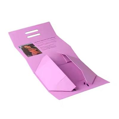 China Folding Gift Box Ribbon Handle Flip Top Magnetic Gift Box Custom Logo Printing Available for sale
