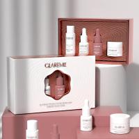 China Luxury Serum Gift Box Set Premium Cosmetic Packaging With Laser Cut Design Elegant Hollow Pattern Gold Foil Stamping for sale