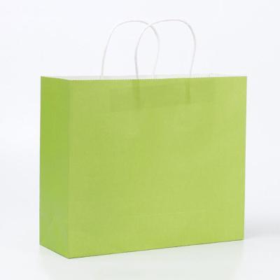 China Customized Logo Kraft Paper Bags For Clothing And Shopping Food And Beverage Takeaway Bags for sale