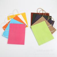 China Customized Logo Kraft Paper Bags For Clothing And Shopping Food And Beverage Takeaway Bags for sale