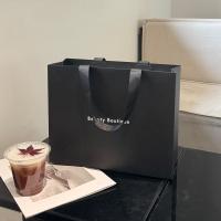 China New Kraft Paper Bag Clothing Store Handbag Packing Gift Gift Bag Packaging Shopping Belt Wholesale for sale