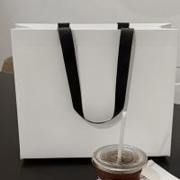 China New Kraft Paper Bag Clothing Store Handbag Packing Gift Gift Bag Packaging Shopping Belt Wholesale for sale