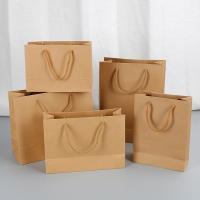 China Solid Color Paper Bag With Logo Printing Thick White Card Shopping Gift Bag Clothing Store Handbag for sale