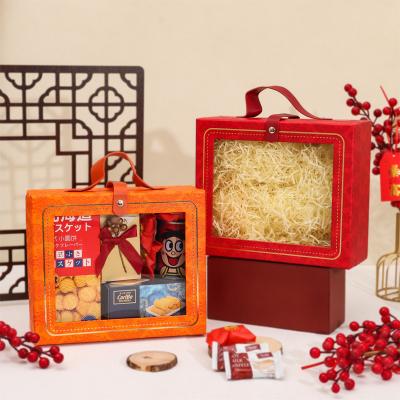 China Luxury Windowed Gift Box Set Premium Packaging Transparent Display Window Leather Handle Design for sale