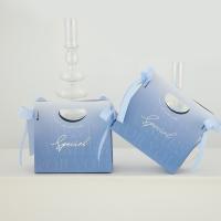 China Gift Box Set Premium Pastel Blue Lavender Packaging Laser Cut Handles Ribbon Bows Gold Foil Luxury Presentation Boxes for sale
