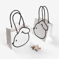 China Creative Cartoon Simple Handbag Paper Bag With Thick Kraft Paper Custom Festive Gift Tote Bag for sale