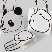 China Creative Cartoon Simple Handbag Paper Bag With Thick Kraft Paper Custom Festive Gift Tote Bag for sale