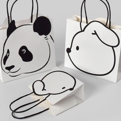 China Creative Cartoon Simple Handbag Paper Bag With Thick Kraft Paper Custom Festive Gift Tote Bag for sale