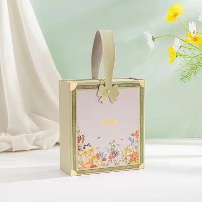 China Sweet Gift Garden Wedding Favor Box Floral Print Bridesmaid Gift Packaging Ribbon Handle Empty Customizable Gift Boxes for sale