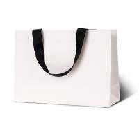 China Embedded Paper Gift Bag Premium Thickened White Card Handled Bag Black Ribbon Handles Luxury Shopping Clothing Packaging Customizable Branding Space for sale
