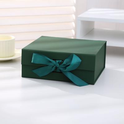 China Emerald Green Flip Top Gift Box One Piece Folding Luxury Packaging Satin Bow Accent Premium Paperboard Construction for sale