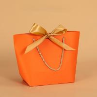 China Premium Fashion Shopping Bag Luxury Ribbon Accented Gift Packaging Twisted Rope Handles for sale
