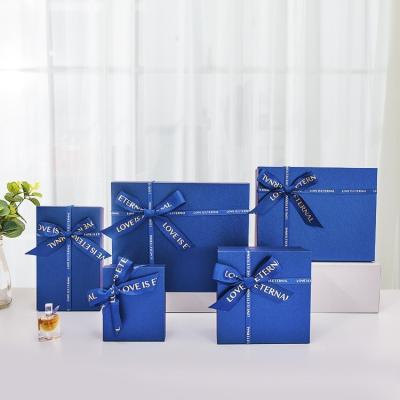 China Customized Bow-shaped Gift Box For Cosmetics And Gifts Top And Bottom Lid Party Favor Box Packaging for sale