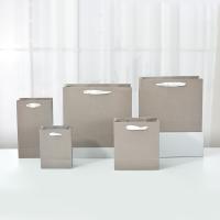China Simple Bow-shaped Gift Bag Packaging Box Cosmetic Gift Wrapping Bag Tote Gift Paper Bag for sale