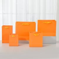 China Simple Bow-shaped Gift Bag Packaging Box Cosmetic Gift Wrapping Bag Tote Gift Paper Bag for sale