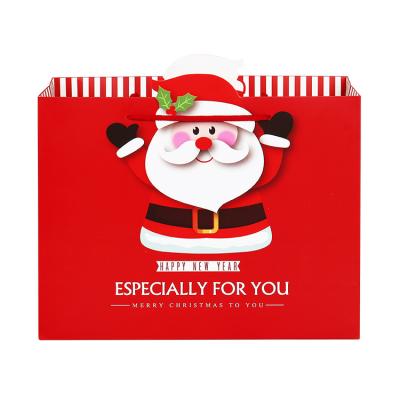 China Cute Christmas cartoon Paper Gift Bags Custom Gift Tote Bags Large Shopping Gift Wrapping Bags for sale