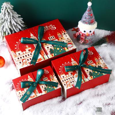 China Merry Christmas Double Door Gift Box Red Festive Bow Design Sturdy Cardboard Construction Christmas Eve Surprise Gift Packaging for sale