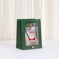 China Christmas Window Gift Bags Holiday Party Candy Packaging Bags Cartoon Santa Claus And Flower Gift Bags Wholesale for sale