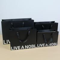 China Thickened Kraft Paper White Cardstock Gift Bags Clothing Store Tote Bags Custom Logo Printing Packaging Bags for sale