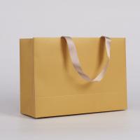China Custom Gold Foil/UV Logo Gold Paper Gift Bag – Handheld Packaging For Apparel Tea & Premium Gifts (Ribbon Handle Option) for sale