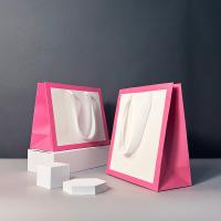 China Simple Clothing Gift Bags Custom Logo Kraft Paper Color-block Packaging Tote Gift Bags for sale