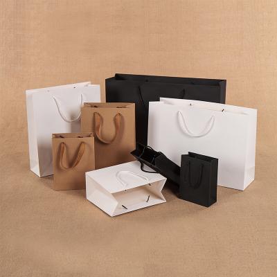 China Clothing And Accessories Store Kraft Paper Bags Logo Printing Available Customizable Tote Bags Takeaway Food Bags for sale