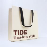 China Kraft Paper Gift Bag Stylish Black Ribbon Handles Ideal for Retail Shopping Branded Packaging Eco Friendly Gifting for sale