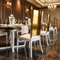 China WENDING Gold Mirror Backrest White-Leg Modern Dining Chair – Luxury Hotel Banquet Chair for sale