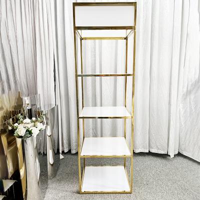 China WENDING Gold Frame White 5-Tier Wedding Display Shelf – Modern Light Luxury Event Rack for sale