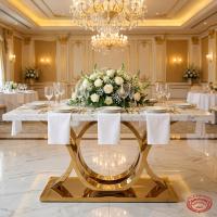 China WENDING Gold Wing-and-Ring Sculptural Base Marble Dining Table – Art Object Hotel Table for sale