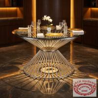 China WENDING Silver Radial Spider-Web Round Dining Table – Sculptural Sunflower Base Hotel Table for sale