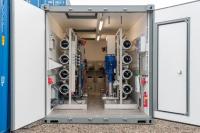 China Containerized Commercial RO System with 10000L/Hour Capacity and 25kw Power for Industrial Water Treatment for sale