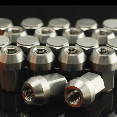 China Black Close End GR5 Titanium Lug Nuts M12x1.25 M14x1.5 PVD Coated for sale