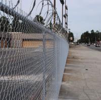 China Galvanized Garden Fence ASTM F668 Standard 6 Feet High Kxb Ends 2 Inch Hole Size Chain Link Fence for sale