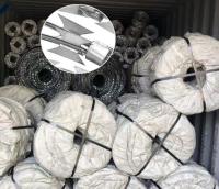 China Hot Dipped Silver Galvanized Barbed Wire Coil Concetrtina Razor Barbed Wire Font with Custom for sale