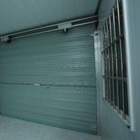 China Readymade Prefabricated Modular House Doorman Room With Rolling Door Quick Deployment for sale