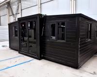 China Durable Q235B/Q345B Steel Frames Expandable Container House with 15mm Fiber Cement Floor and 15+ Year Lifespan for sale