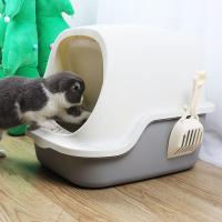 China Fully Enclosed Cat Litter Pan Waterproof Hooded Cat Litter Box With Shovel for sale