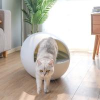 China Low Noise Egg Type Self Cleaning Cat Litter Box Toilet Semi Enclosed Splash Deodorant for sale