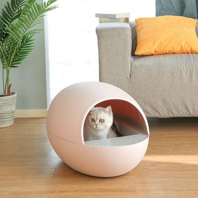 China Low Noise Egg Type Self Cleaning Cat Litter Box Toilet Semi Enclosed Splash Deodorant for sale