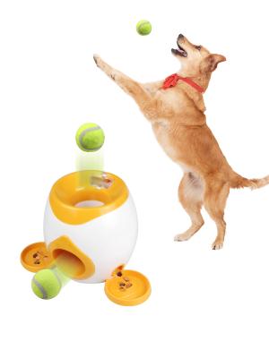 China Pet Treat Dispenser Double Hole Tennis Throwing Food Reward Machine 900g for sale