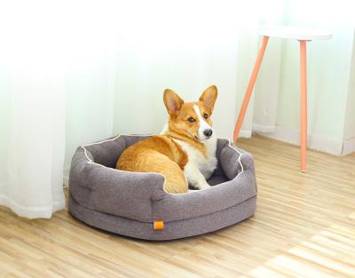 China Detachable Comfortable Pet Bed Round Orthopedic Dog Sofa Sponge Massage Deep Sleep for sale