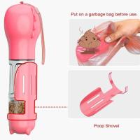 China 4 In1 Portable Leakproof Pink Dog Water Bottle With Food Container & Waste Bag for sale