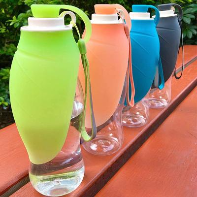 China Portable BSCI Silicone Dog Water Bottle 580ML With Bone Poop Bag Dispenser for sale