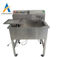 China Jzj30 Industrial Chocolate Pouring Pot Chocolate Melting Tempering Machine for sale