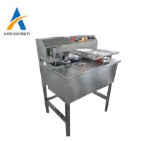 China Jzj30 Industrial Chocolate Pouring Pot Chocolate Melting Tempering Machine for sale