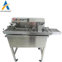 China Nuts Tempering Chocolate Making Machine 150kg Per Hour Snack Enrobing Machine for sale